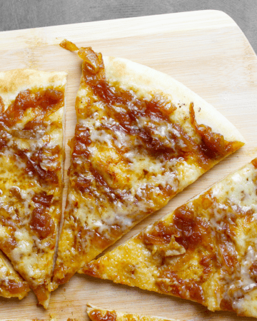 French Onion Pizza With Boozy Caramelized Onions & Gruyère