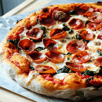 Recipe Roundup: 8 Comfort Food Pizzas to Cozy Up with in the New Year