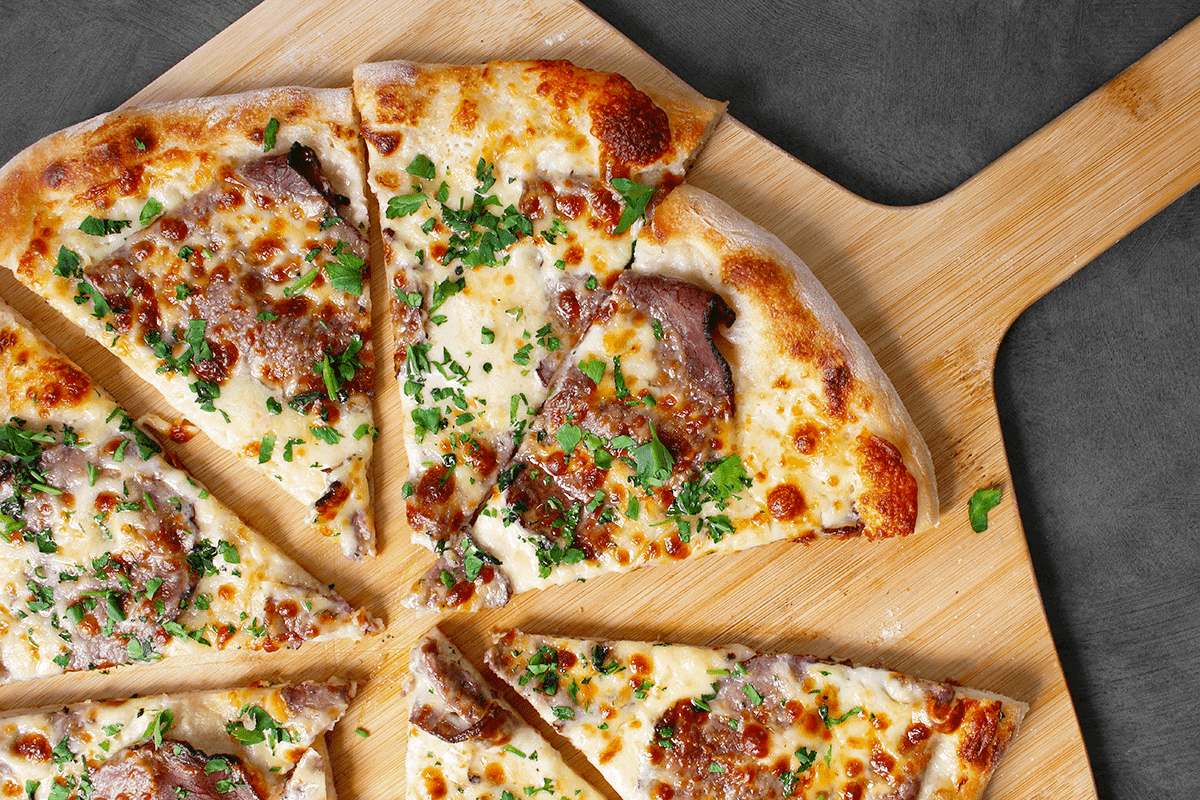 Roast Beef Pizza with Horseradish Sauce, Provolone, and Au Jus